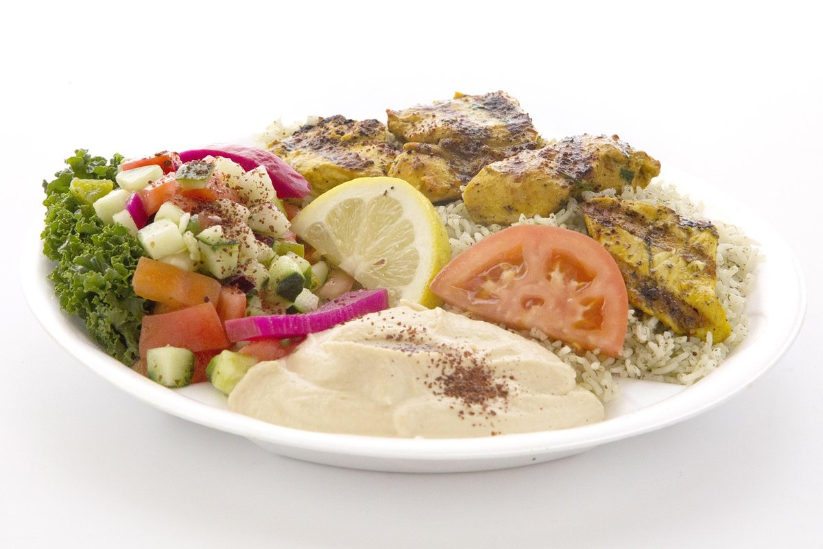 Can Chickens Safely Eat Rice? Benefits and Risks Explained - Feathered ...